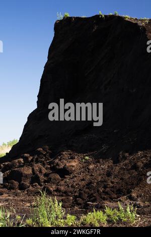 Mound of brown topsoil in commercial sandpit Stock Photo - Alamy