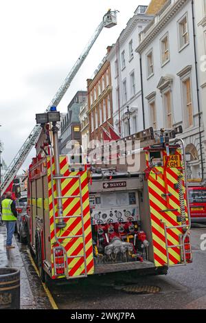 London Fire Brigade Ladder truck on a call out in Soho Square Central ...