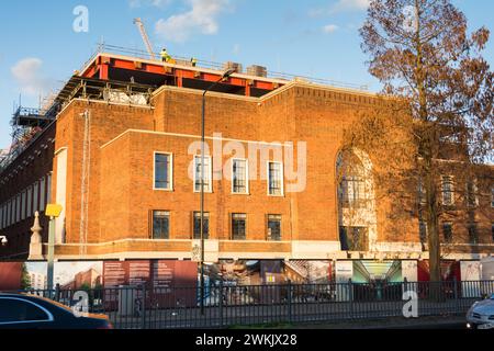 Workmen ontop of Hammersmith Town Hall during redevelopment, Great West ...