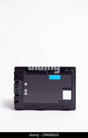 Black rectangular camera battery isolated on white background. The ...