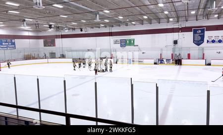 Youth Hockey Teams Competing on the Ice in an Indoor Arena Stock Photo ...