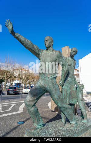 Monument in honor of the Azorean emigrant on an avenue in Ponta Delgada ...
