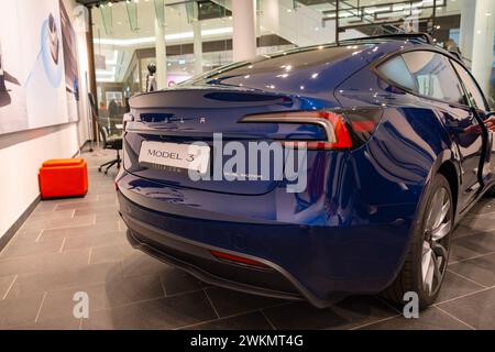 blue Tesla electric car model 3 in Studio, autopilot and eco-friendly ...