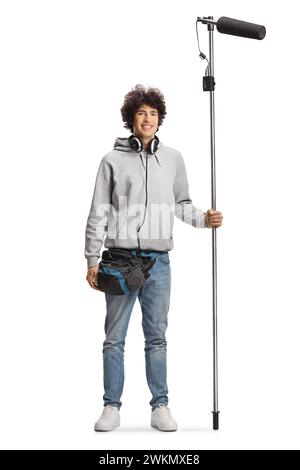 Boom operator with headphones and microphone smiling at camera isolated ...