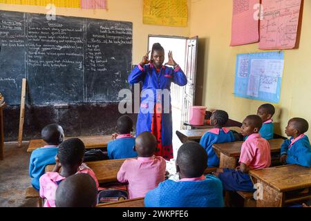 Yaounde, Cameroon. 19th Feb, 2024. Students take notes during a class ...