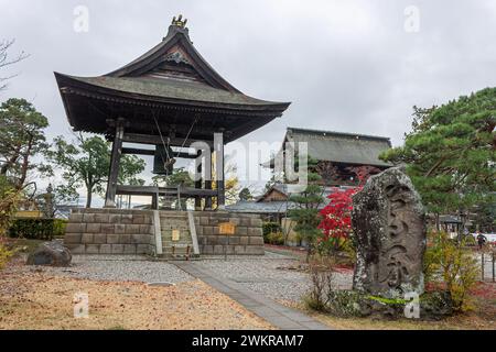 Nagano, Japan. The bell tower in the grounds of Zenko-ji, a Japanese ...