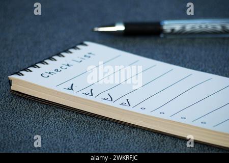 A businessman preparing checklist at office desk Stock Photo - Alamy