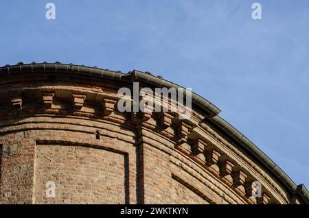 particular architecture, frame of a neoclassical building with exposed bricks, with pilasters ...