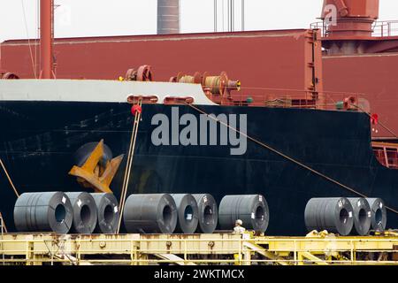 Shipment of coiled steel iron plates manufactured at a steel ...