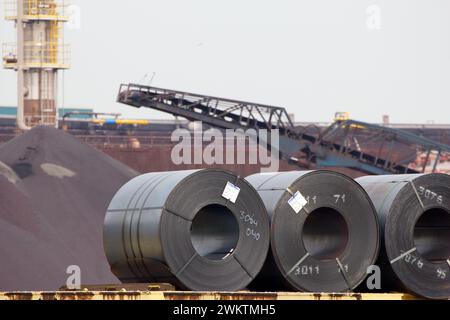 Coiled steel iron plates manufactured at a steel manufacturing plant ...