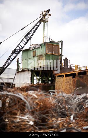 Crane, machine and junkyard for moving metal with sustainability ...