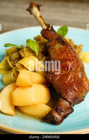 Roasted goose leg with cabbage papardelle pasta and quince compote ...