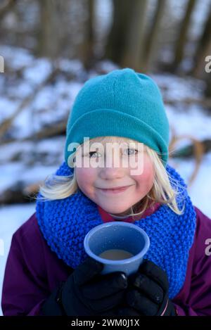 portrait of child wearing warm clothes. express emotion. winter fashion ...