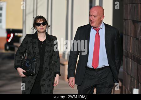 "Rust" movie armorer Hannah Gutierrez-Reed, right, talks with her ...