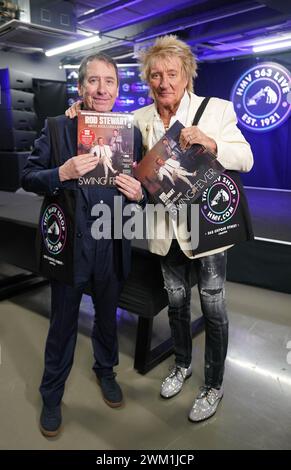 Jools Holland (left) and Rod Stewart during a signing session for their ...