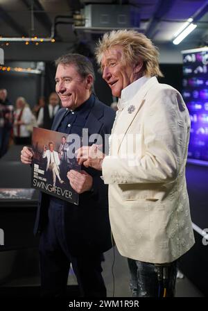 Jools Holland (left) and Rod Stewart during a signing session for their ...