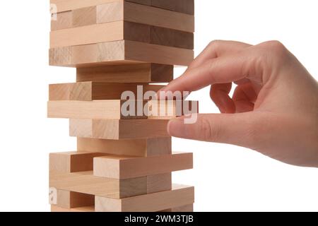 Woman playing Jenga on white background, closeup Stock Photo - Alamy