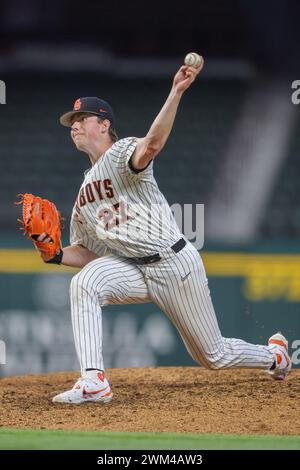 February 23, 2024: Sam Garcia #27 Cowboys pitcher prepares to deliver a ...