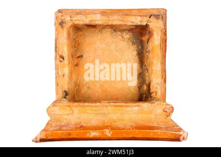 Old orange glazed furnace tile isolated on white background Stock Photo ...