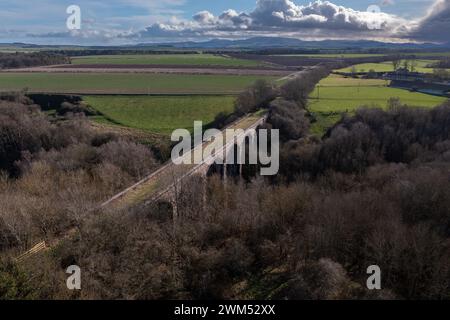 The disused railway viaduct crossing the Rutchey Burn near Norham which ...