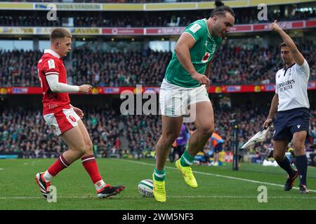 Ireland's James Lowe scores their side's third try during the Guinness ...