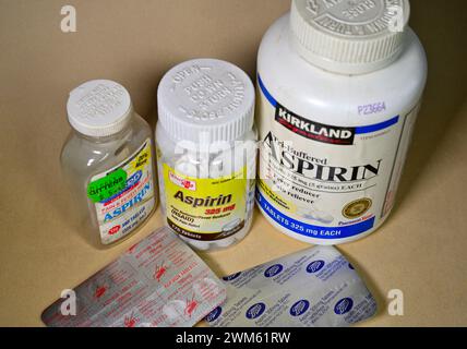 Aspirin tablets, pills individually wrapped in foil packaging which can ...