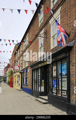 Flags along the Main Street of Ashbourne town; Peak District National ...