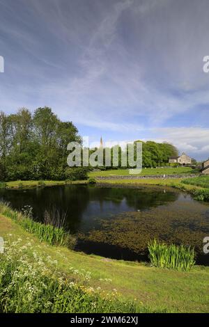 Summer view over Monyash village pond, Peak District National Park ...