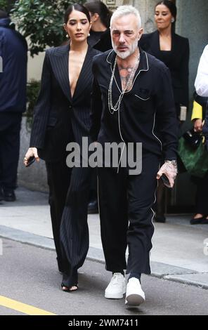 Milan, It. 24th Feb, 2024. Gianluca Vacchi accompanies his wife Sharon ...