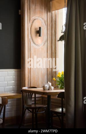 empty table in cafe near window copy space inside interior Stock Photo ...