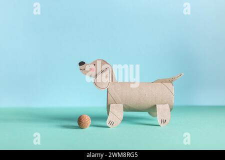 a dog made out of toilet paper roll, cut out of cardboard, dachshund ...