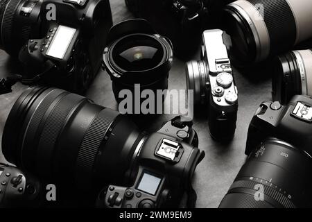 Modern cameras on dark gray marble table, flat lay Stock Photo - Alamy