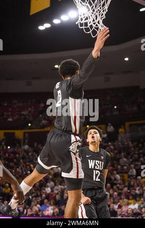 Washington State Cougars guard Myles Rice (2) looks to pass the ball in ...