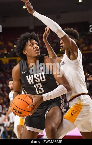 Washington State Cougars forward Isaac Jones (13) drives against USC ...