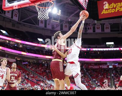 Boston College forward Quinten Post takes a shot as Clemson guard Chase ...