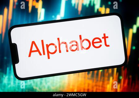 In this photo illustration a Alphabet logo seen displayed on a ...