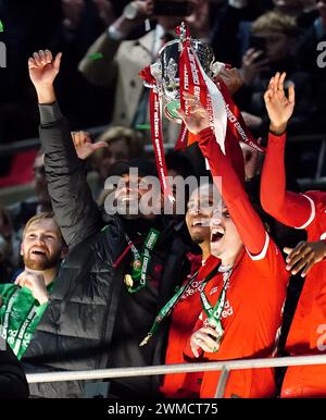 Liverpool's Virgil van Dijk lifts the Premier League trophy with team ...