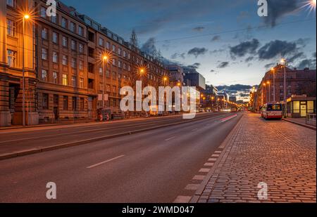 Prague, Czech Republic. 02-24-2021. Young woman checking her phone is ...