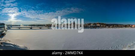Bridge and scenic clouds over Ume river in Umea, northern Sweden Stock ...