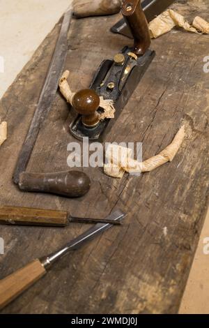 carpentry chisels and plane on wooden boards Stock Photo - Alamy