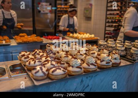 Fresh pecan cream donuts doughnuts for display at Donutelier at Charing ...
