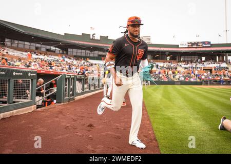 San Francisco Giants' Luis Matos holds a bat in the dugout before a ...