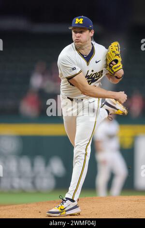 February 25, 2024: Dylan Vigue #27 Michigan pitcher works on the mound ...
