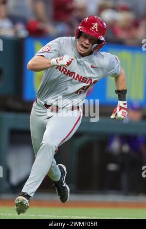 February 25, 2024: Razorback base runner Jared Sprague-Lott #12 works ...