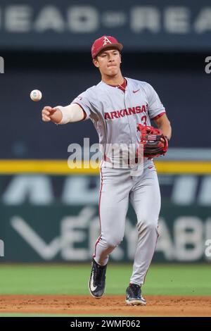 February 25, 2024: Razorback base runner Jared Sprague-Lott #12 works ...