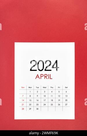 April 2024 calendar page with red push pin on yellow background Stock ...