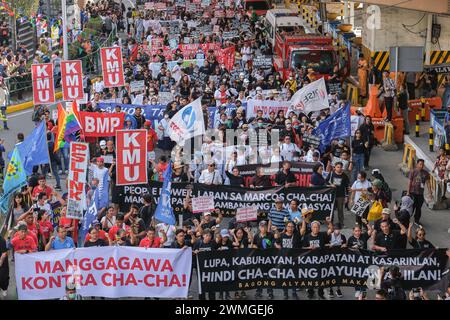 Thousands of Filipino activists commemorated the 38th EDSA People Power ...