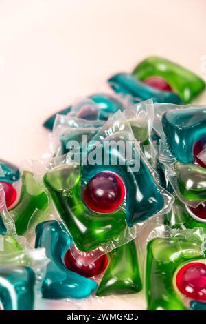 Eco-friendly clothes cleaning, capsules for machine washing. Bright red ...