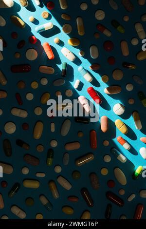 A high angle shot of colorful tablets on dollar money - pandemic ...
