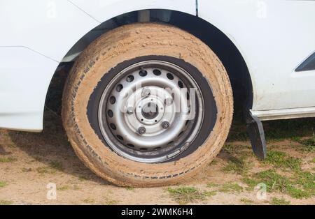 Car wheel completely covered in mud. Total loss of tire grip Stock ...